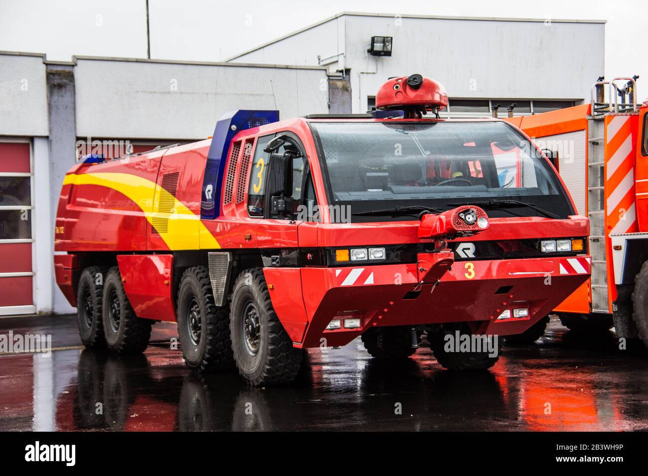 red fire engine on airfield Stock Photo - Alamy