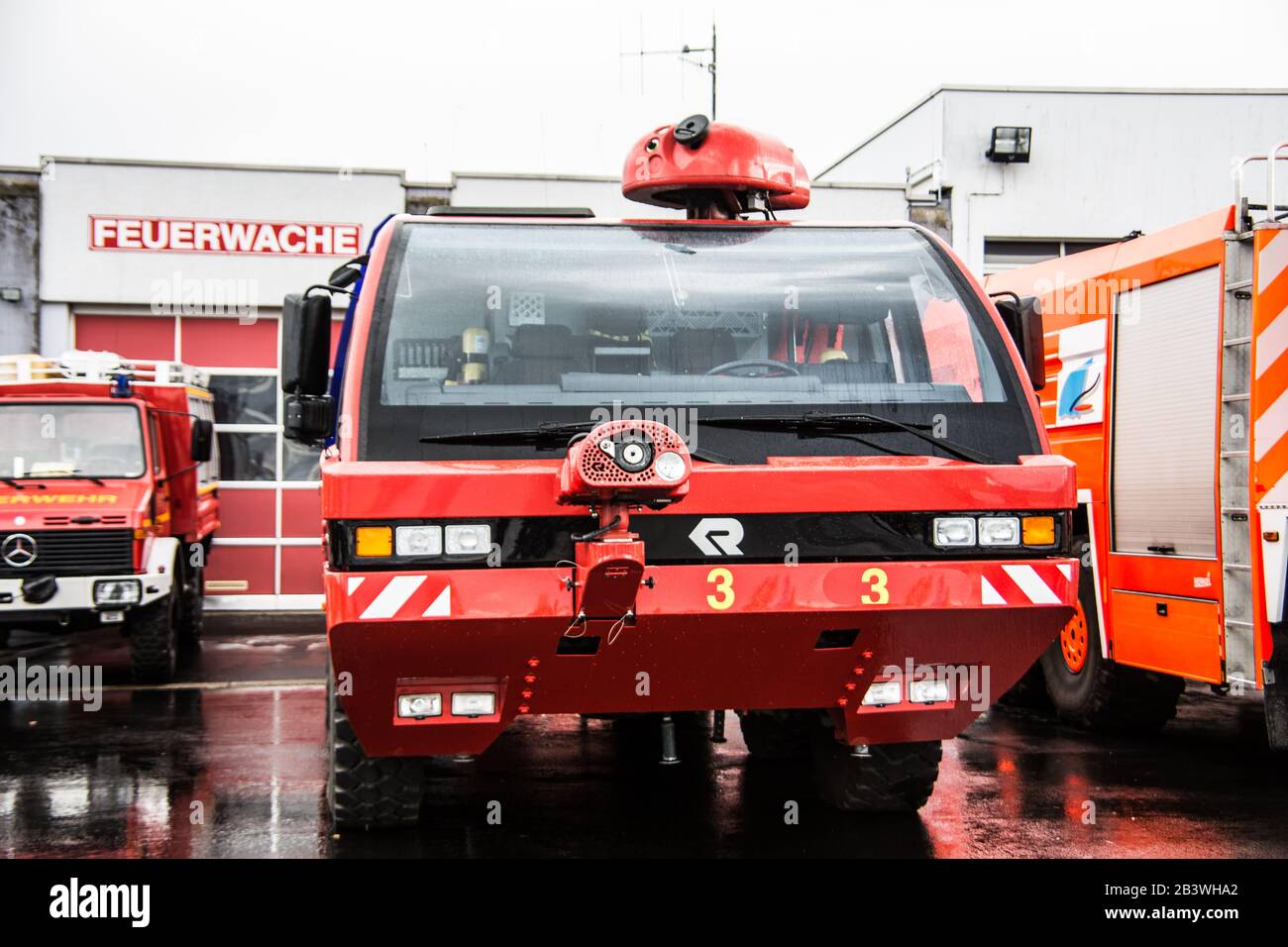 red fire engine on airfield Stock Photo - Alamy