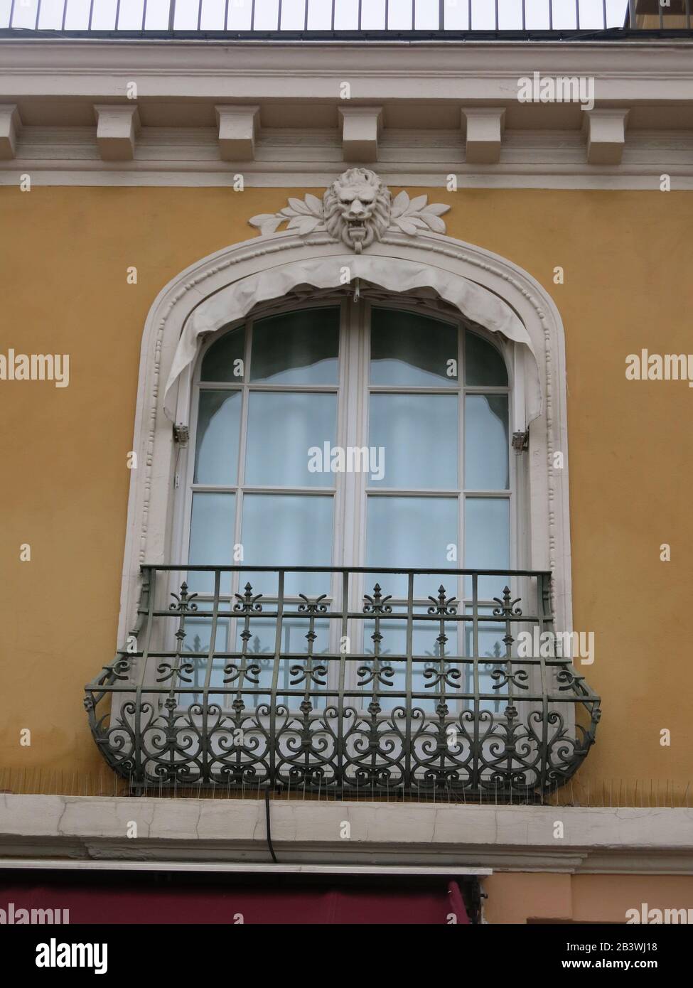 A Mediterranean style of architecture with wooden shutters at all the ...
