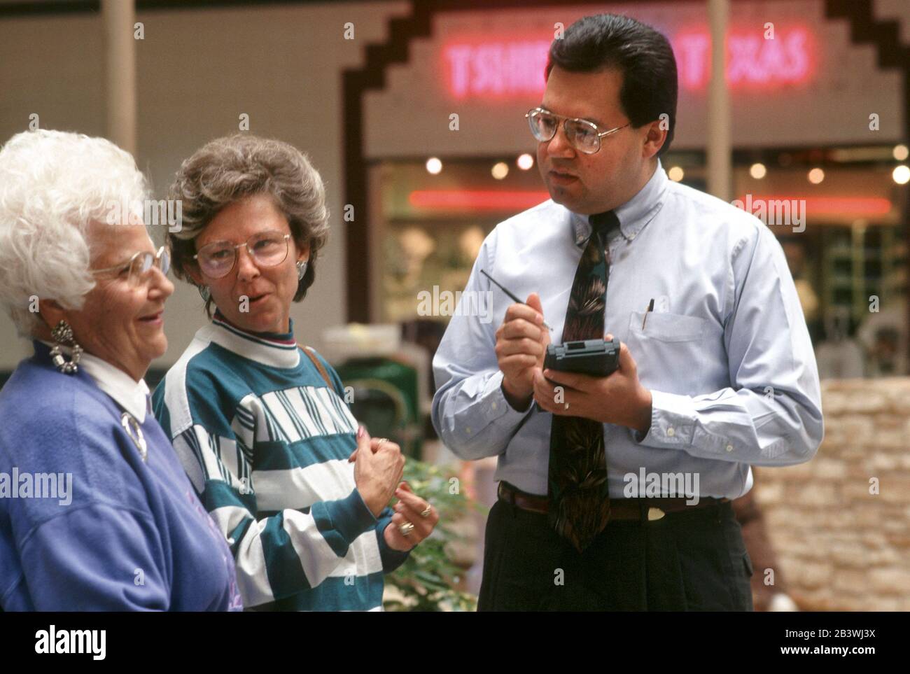 Newton hand held hi-res stock photography and images - Alamy