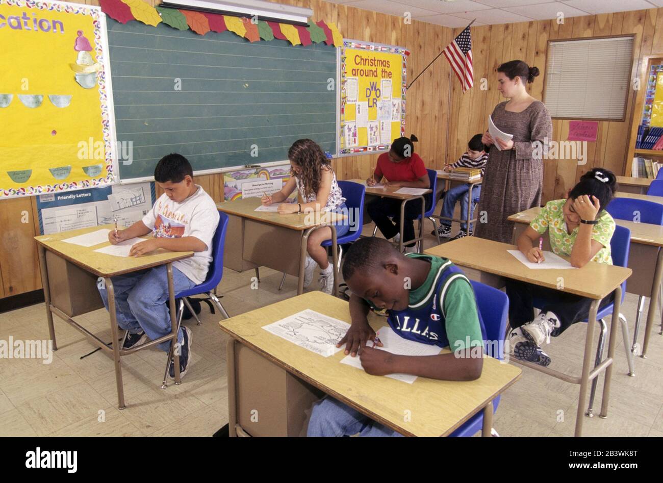 Austin Texas USA: Fourth grade students taking pop quiz in classroom ...