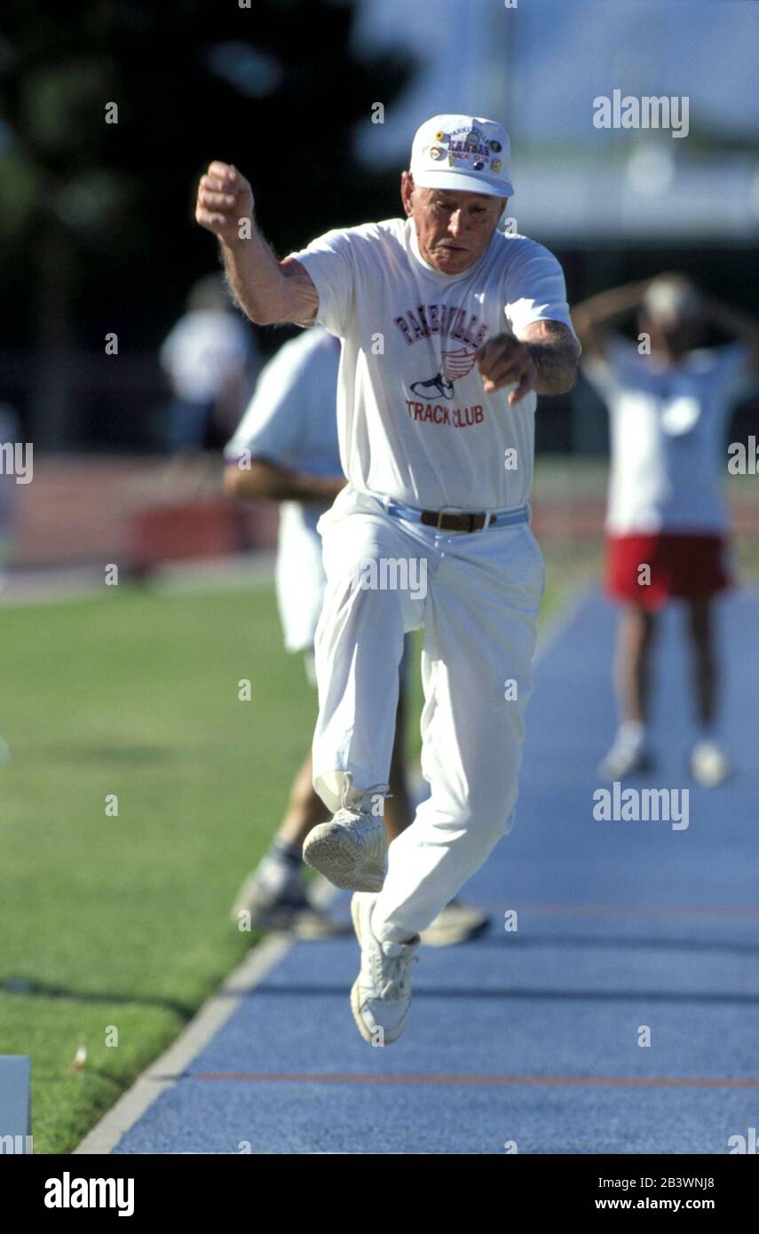 Tucson, Arizona USA, 1997: Man competing in the long jump event at the ...