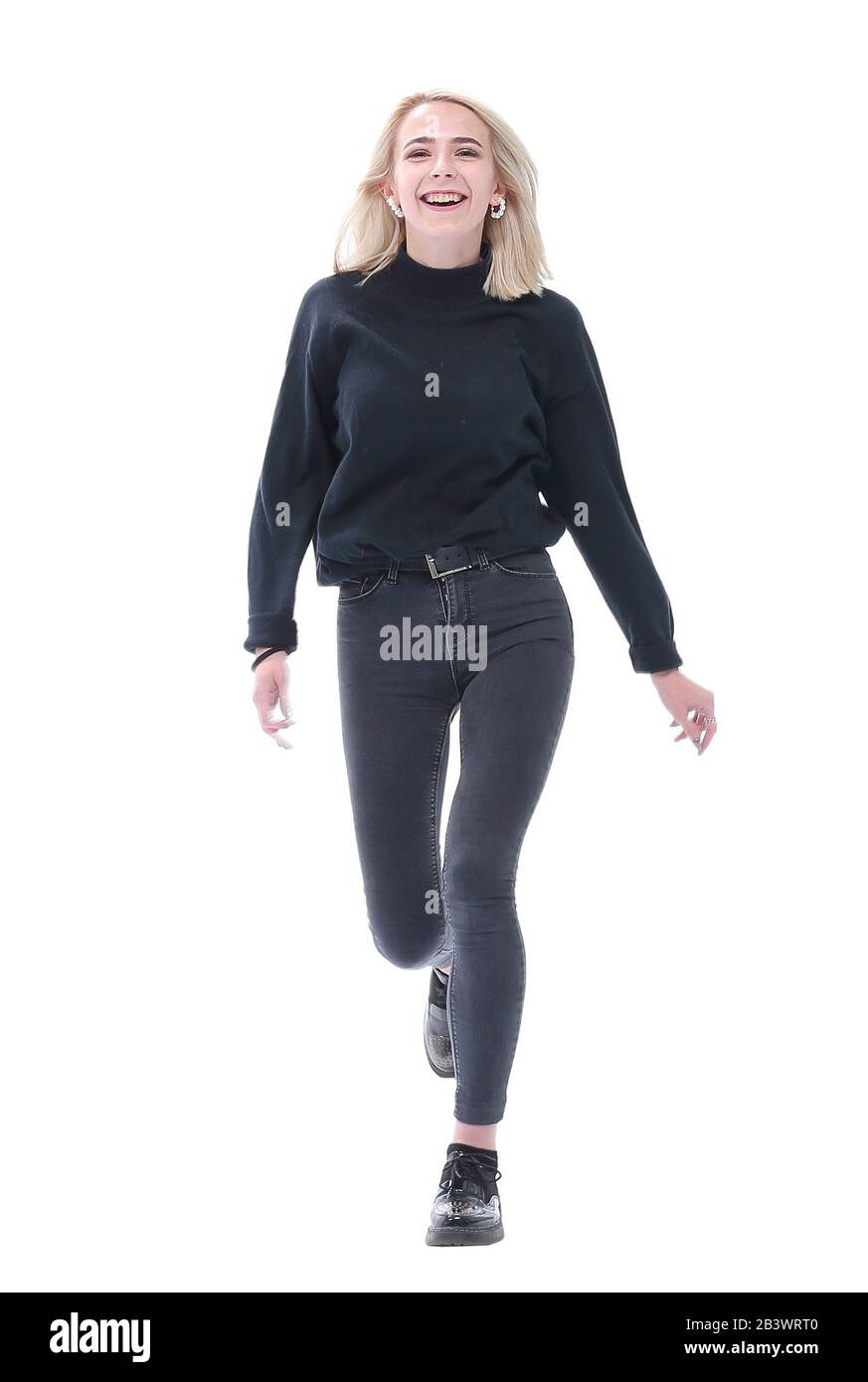 in full growth. happy young woman moving forward Stock Photo - Alamy