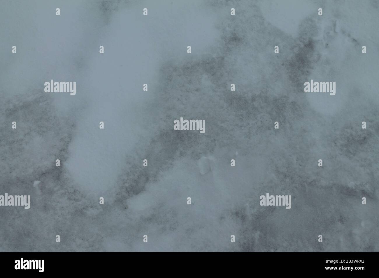 Surface covered with gray snow and ice. Winter background for design ...