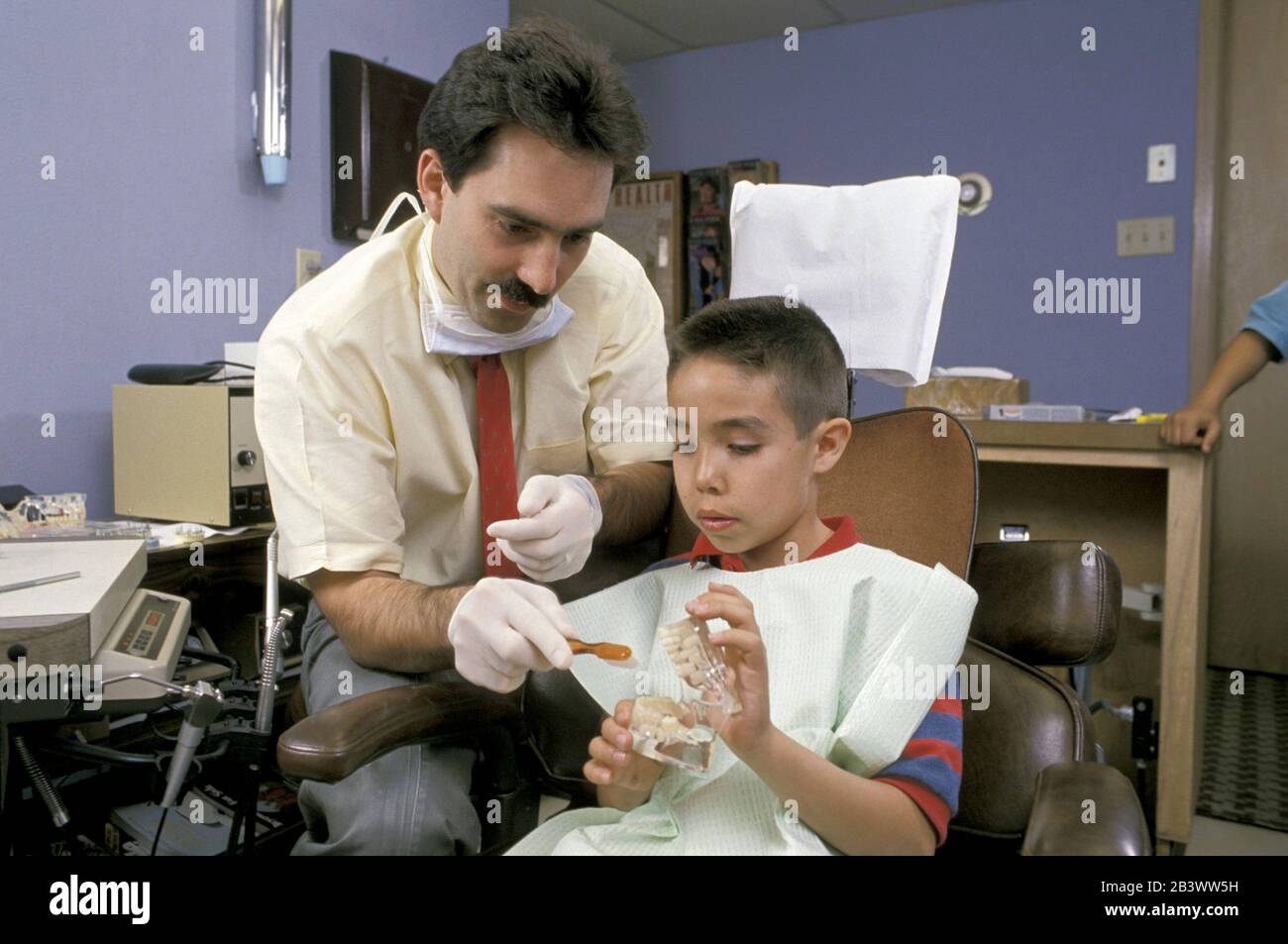 Hispanic boy in dental chair hi-res stock photography and images - Alamy