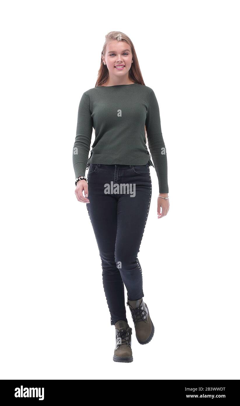 in full growth. smiling girl student striding forward Stock Photo - Alamy