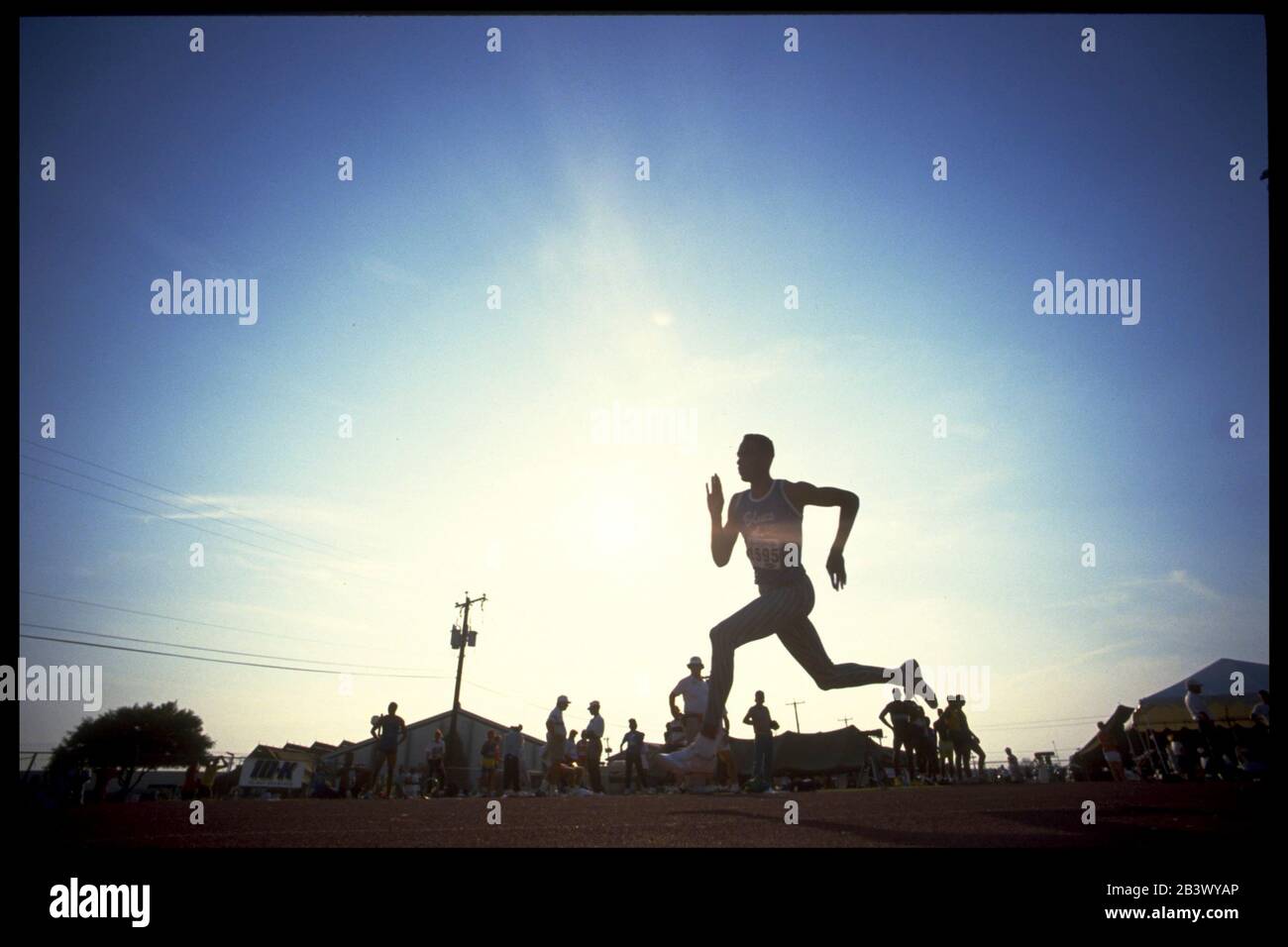San Antonio, Texas: Male teen runner competing in 400-meter race ...