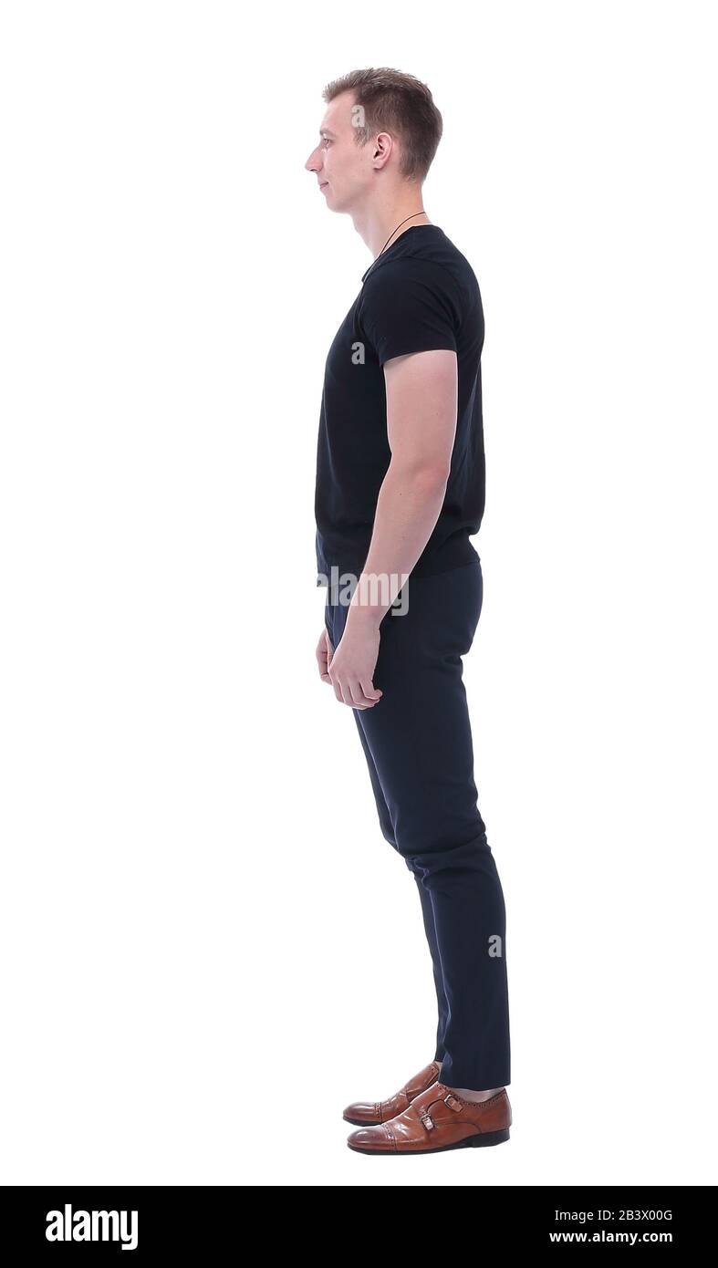 side view. handsome guy looking at a white wall Stock Photo - Alamy