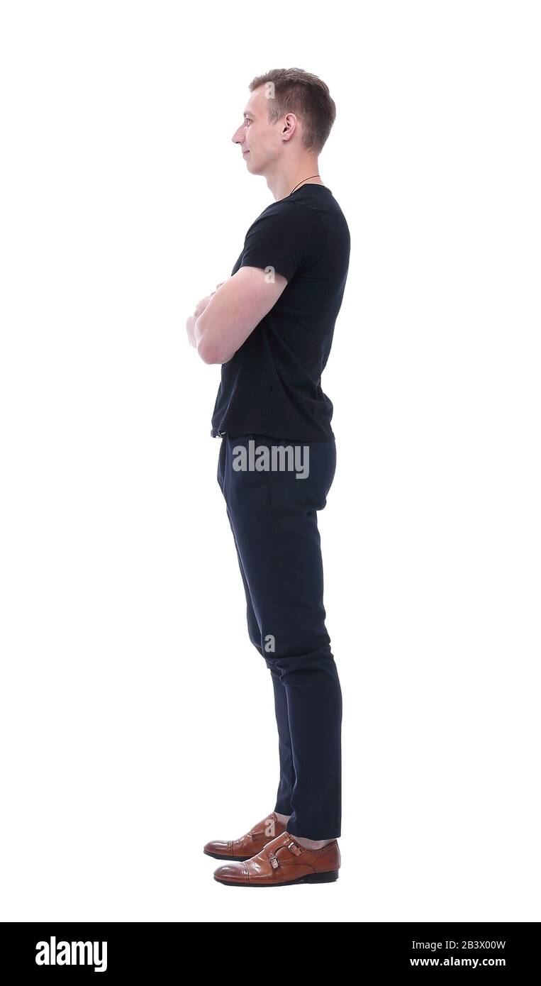 side view. handsome guy looking at a white wall Stock Photo - Alamy