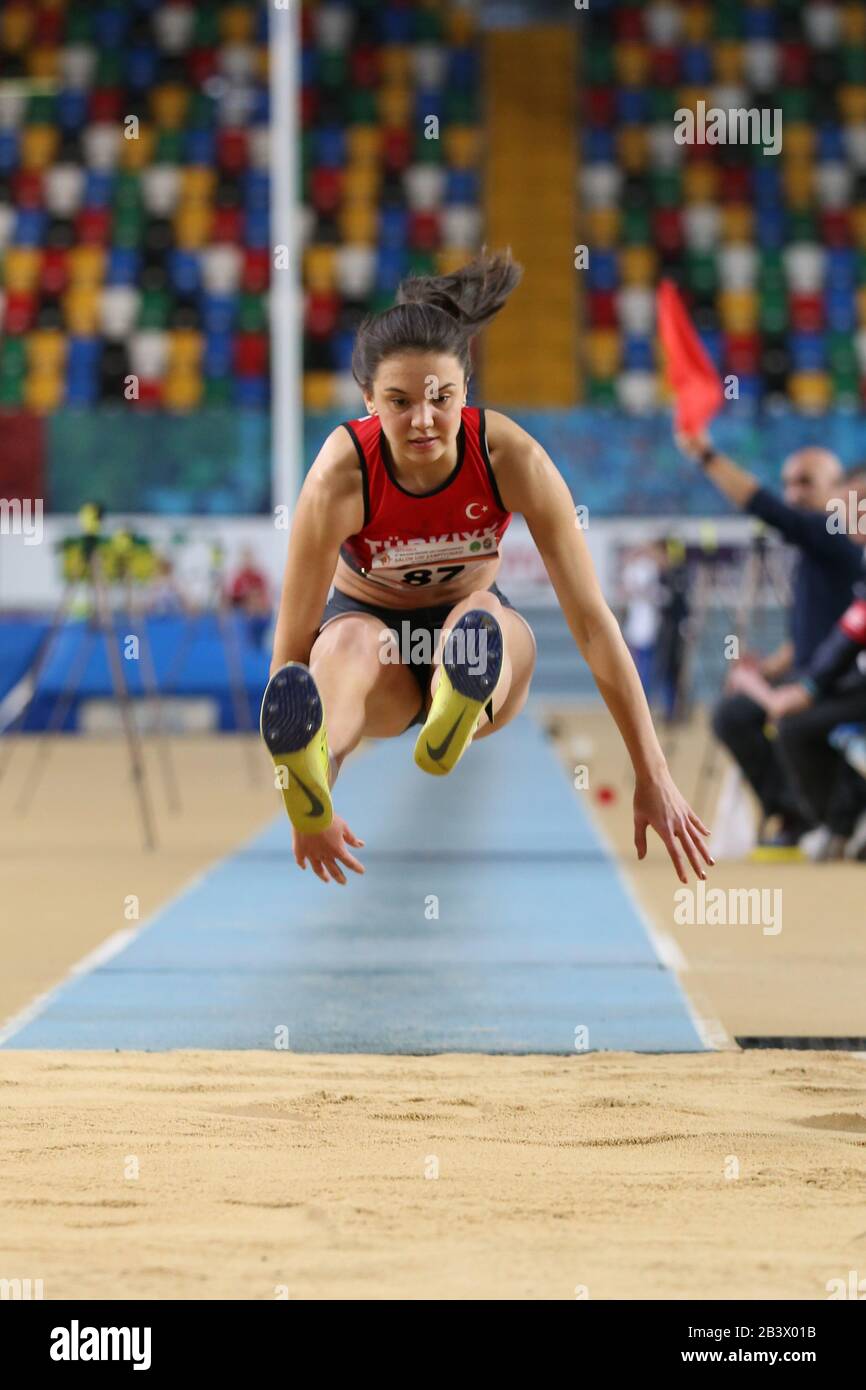 ISTANBUL, TURKEY - FEBRUARY 09, 2020: Undefined athlete triple jumping ...