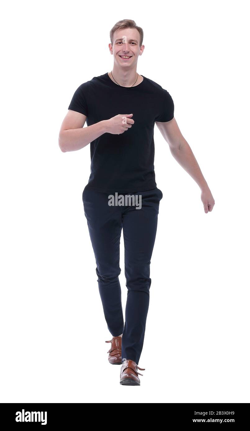 in full growth. happy young man moving forward Stock Photo - Alamy