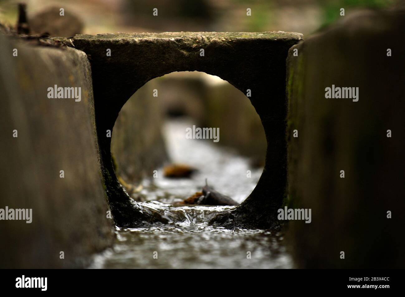 Water flow running inside an artificial channel/ Abstract imagery for ...
