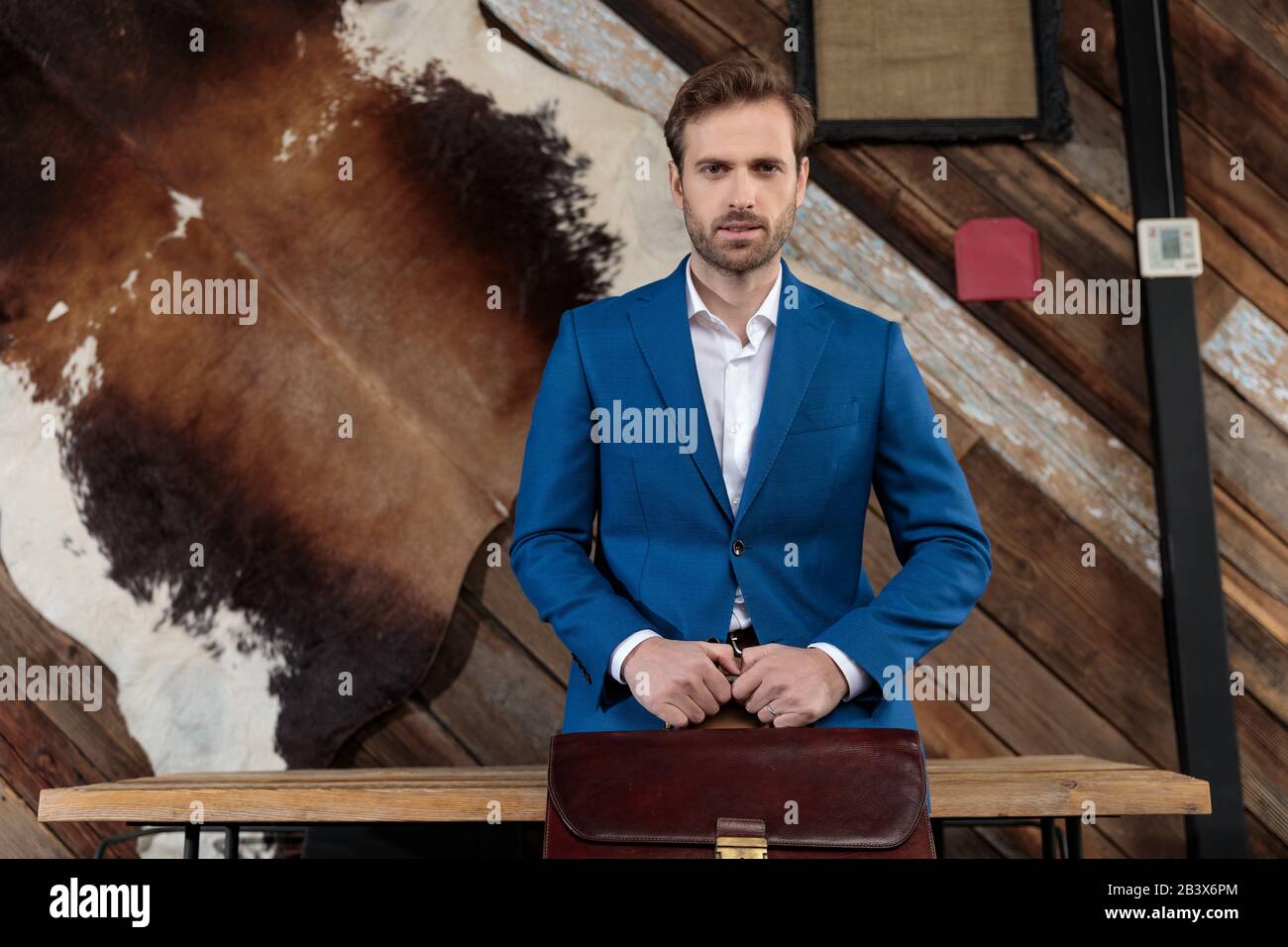 Man leaning forward suit hi-res stock photography and images - Alamy