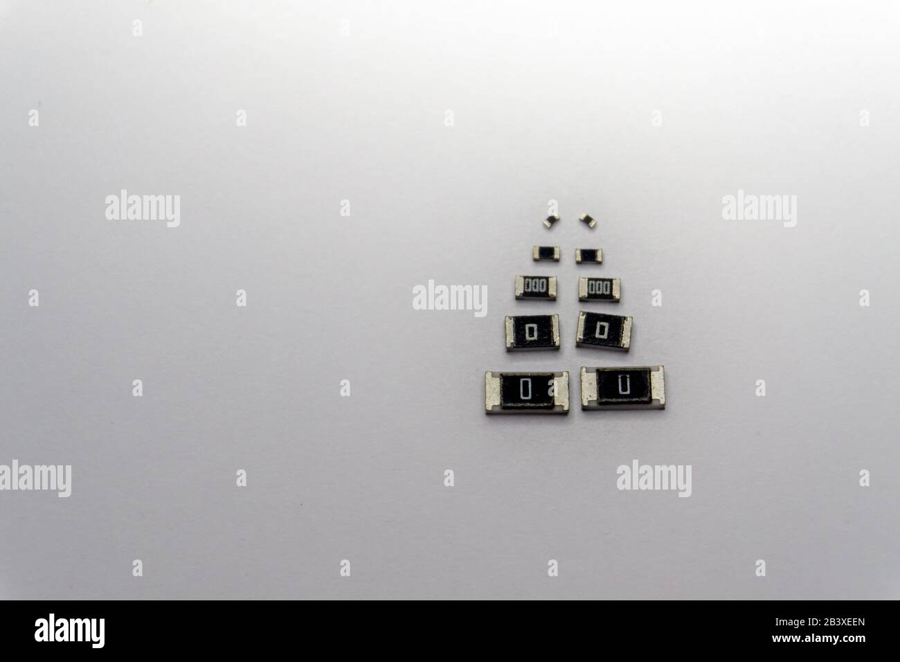 Abstract macro close-up of SMT surface mount chip resistors smart power ...