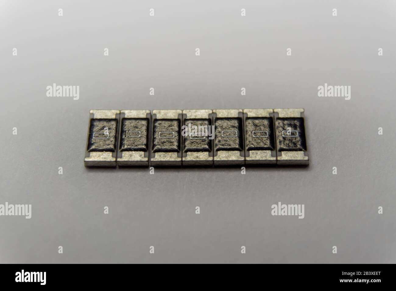 Abstract macro close-up of SMT surface mount chip resistors smart power ...