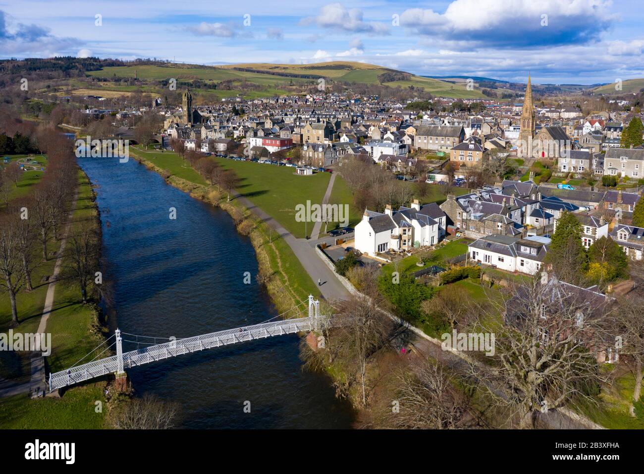 Aerial view of River Tweed flowing through town of Peebles in the ...