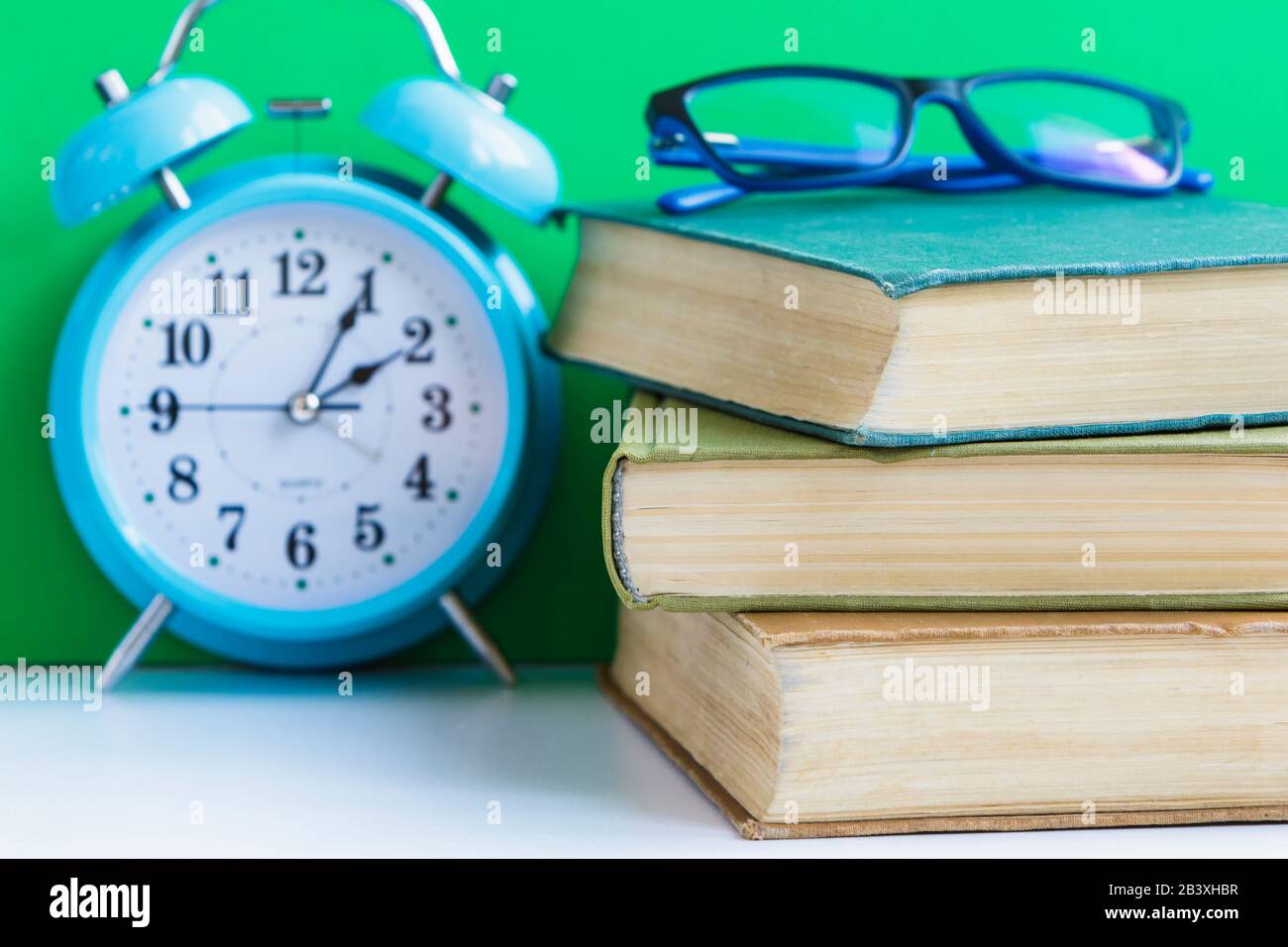 Book stack glasses hi-res stock photography and images - Alamy