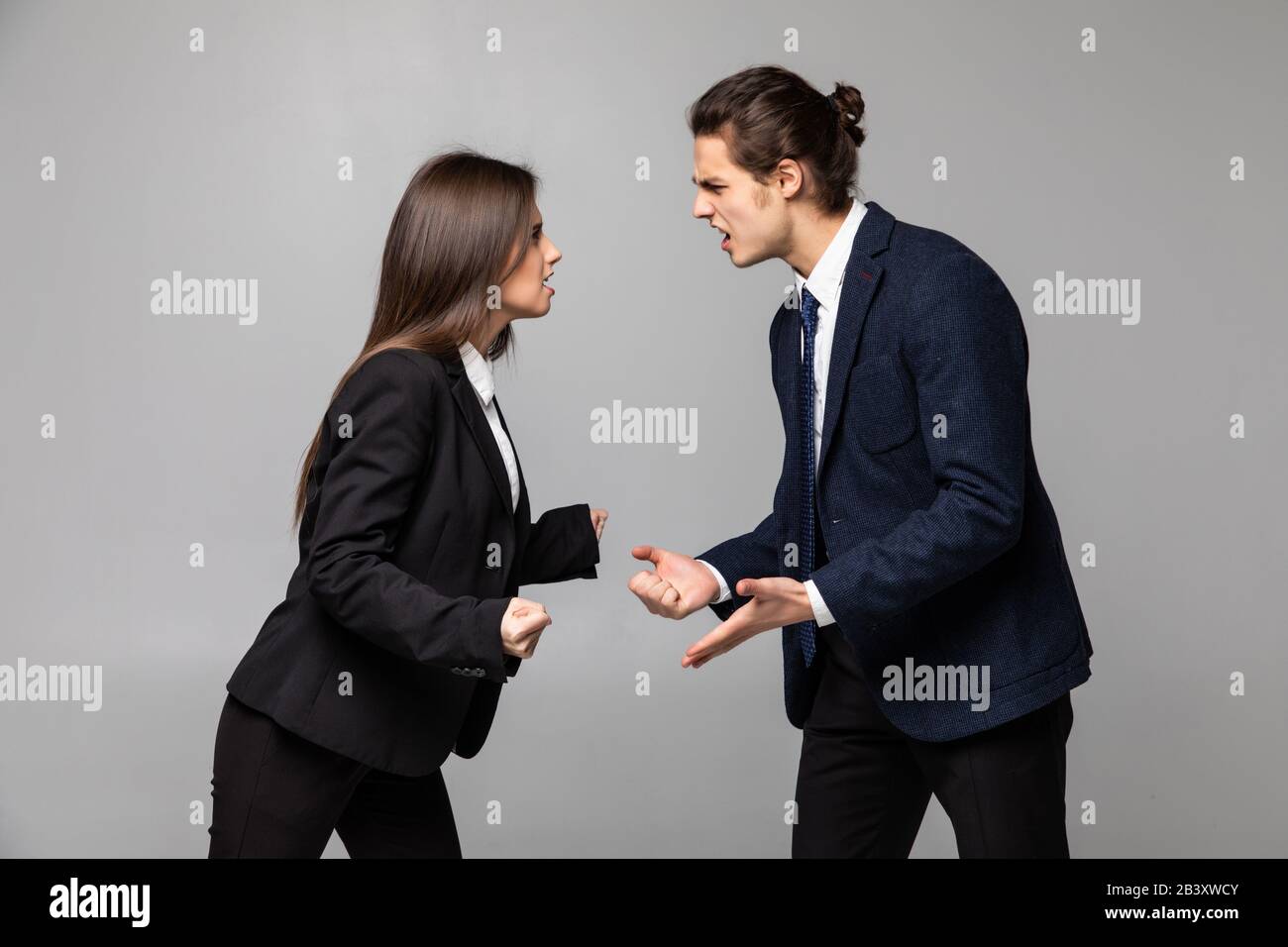 Photo of displeased angry quarrel business colleagues couple isolated ...