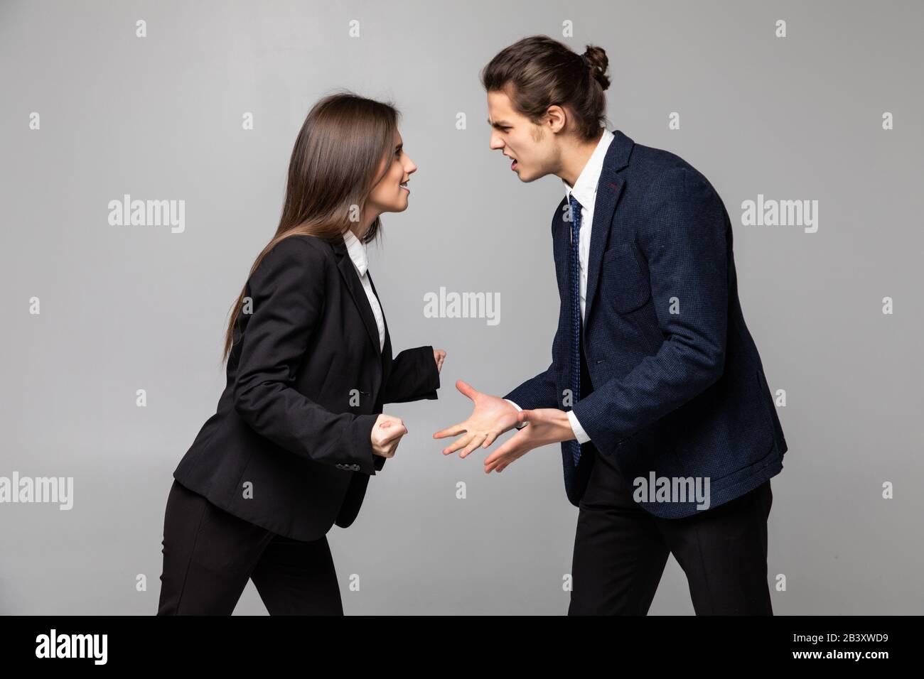 Photo of displeased angry quarrel business colleagues couple isolated ...