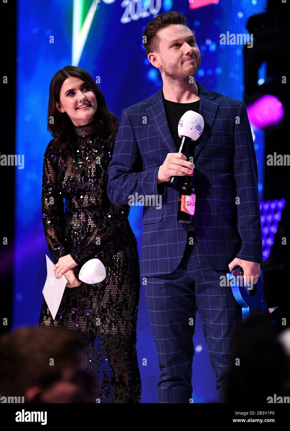 Hosts Aimee Vivian (left) and Will Manning on stage at the Global ...