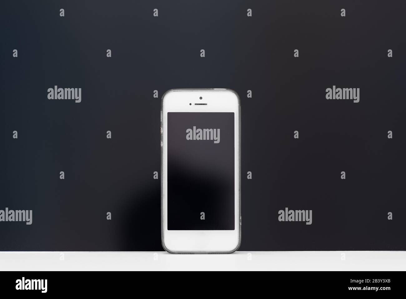 White smartphone. Mobile phone with black screen Stock Photo - Alamy