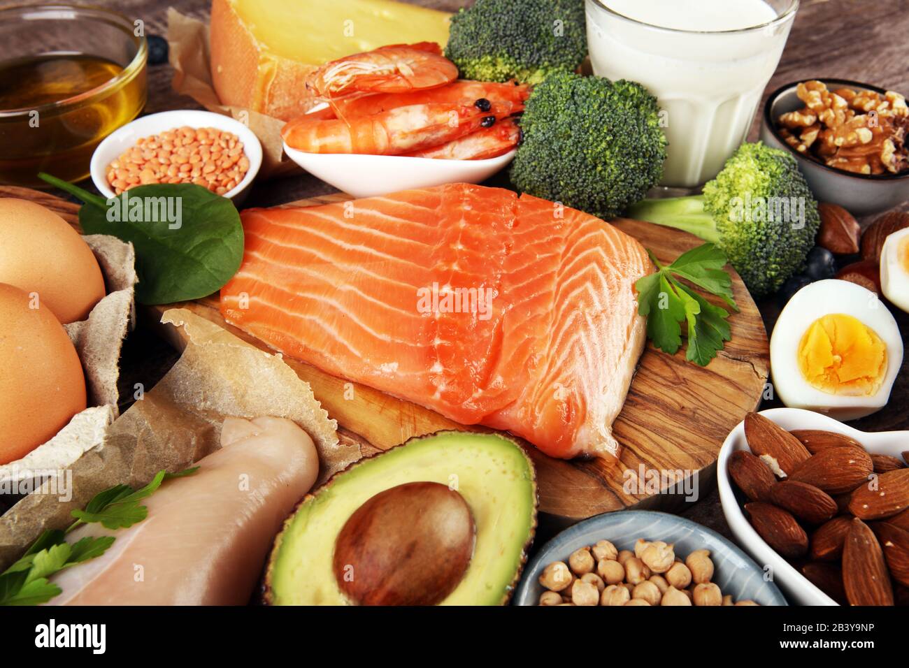 healthy eating and diet concept - natural rich in protein food on table ...