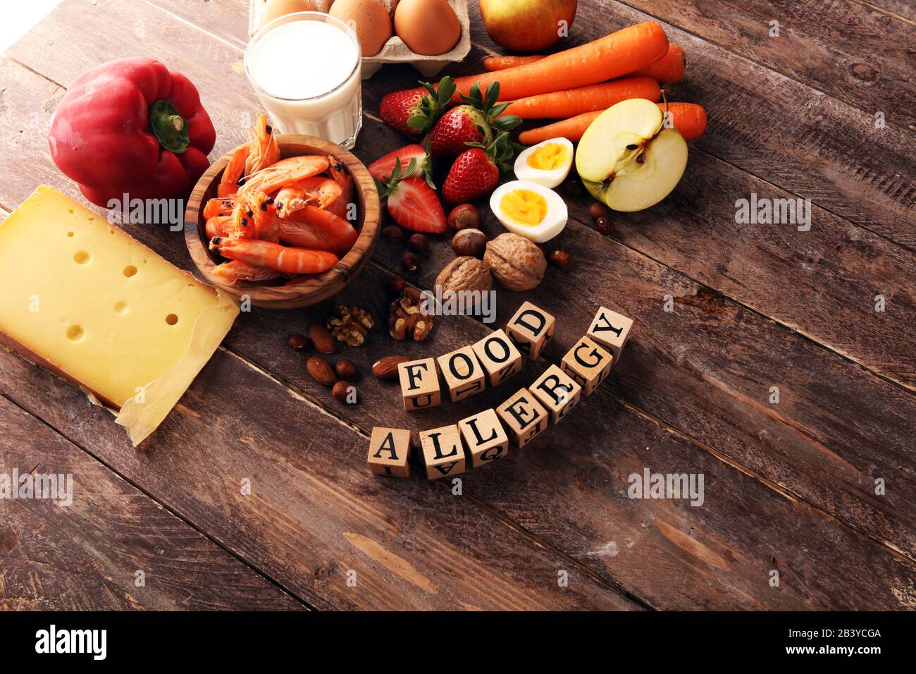 Allergy food concept. Allergy food as almonds, milk, cheese, strawberry ...