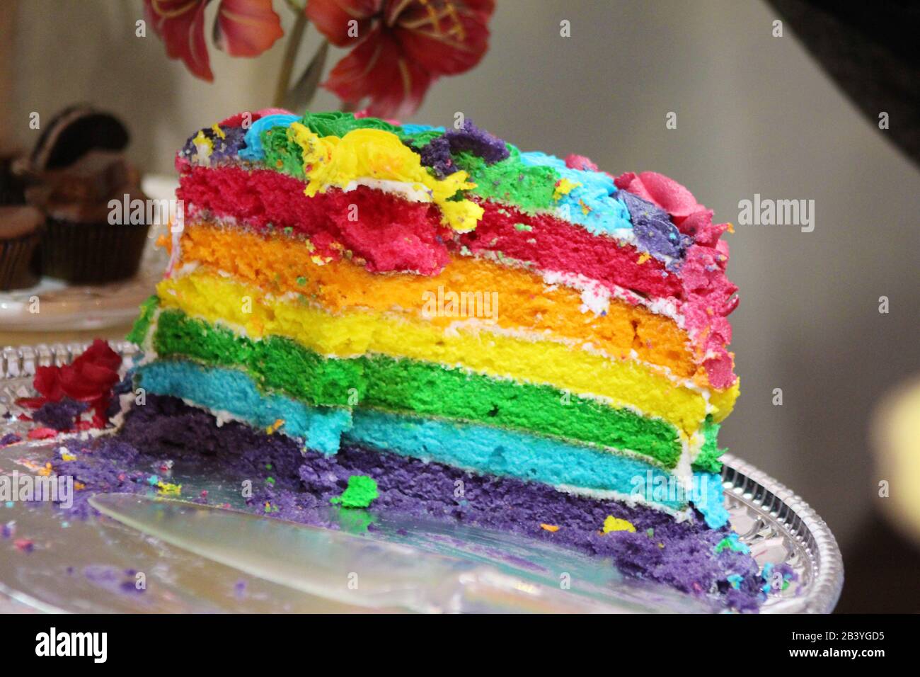 multi colored delicious cake slice, rainbow cake Stock Photo - Alamy