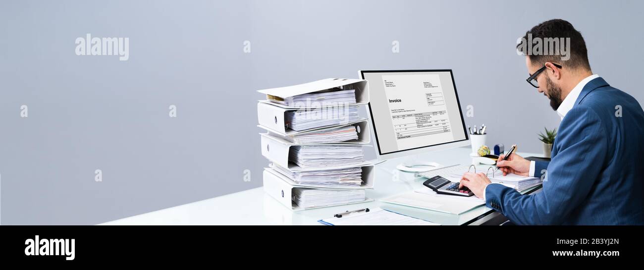 Accountant using software invoices hi-res stock photography and images ...