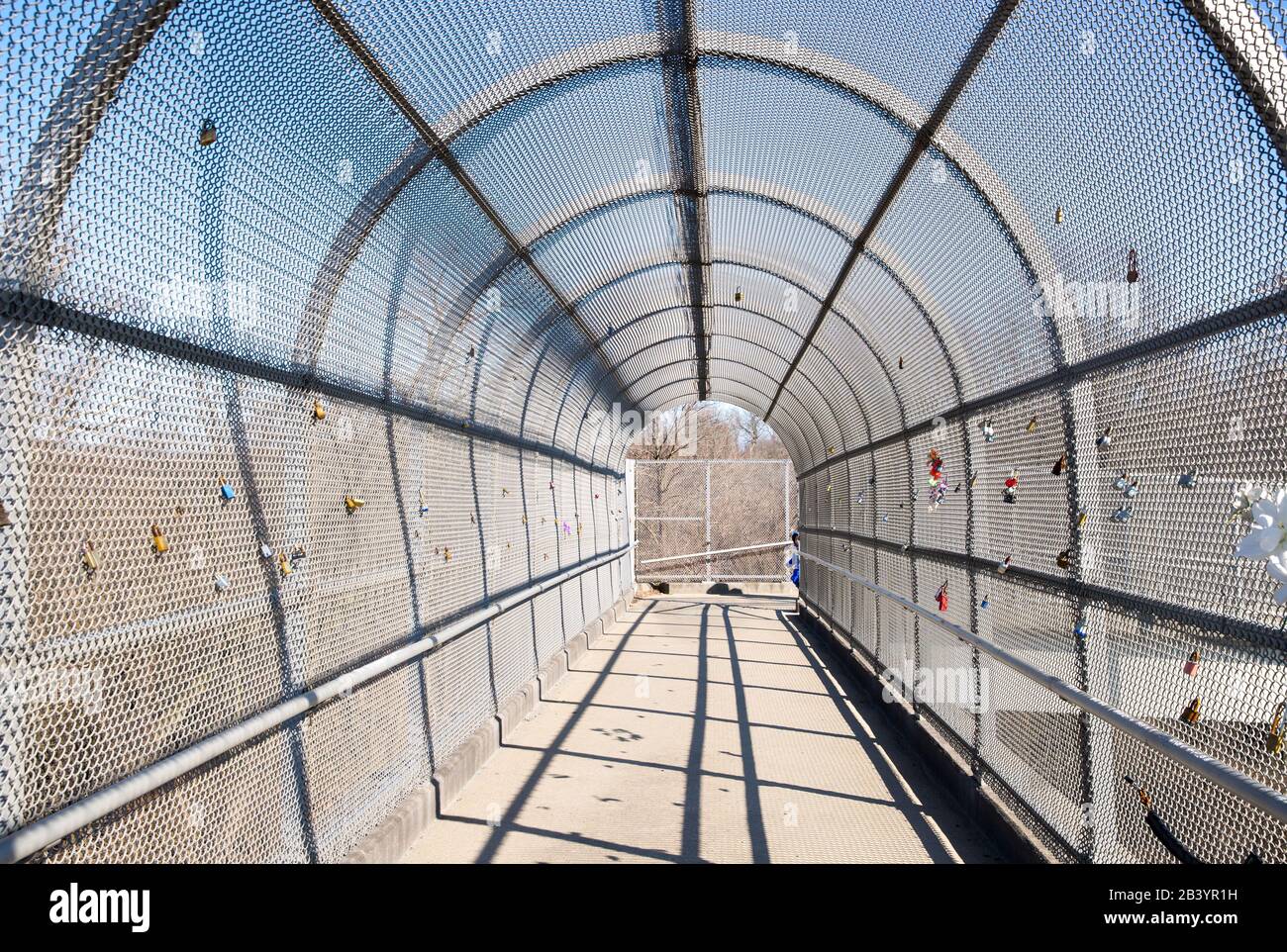 Locks on the fenced walk over bridge in highway -Image Stock Photo - Alamy
