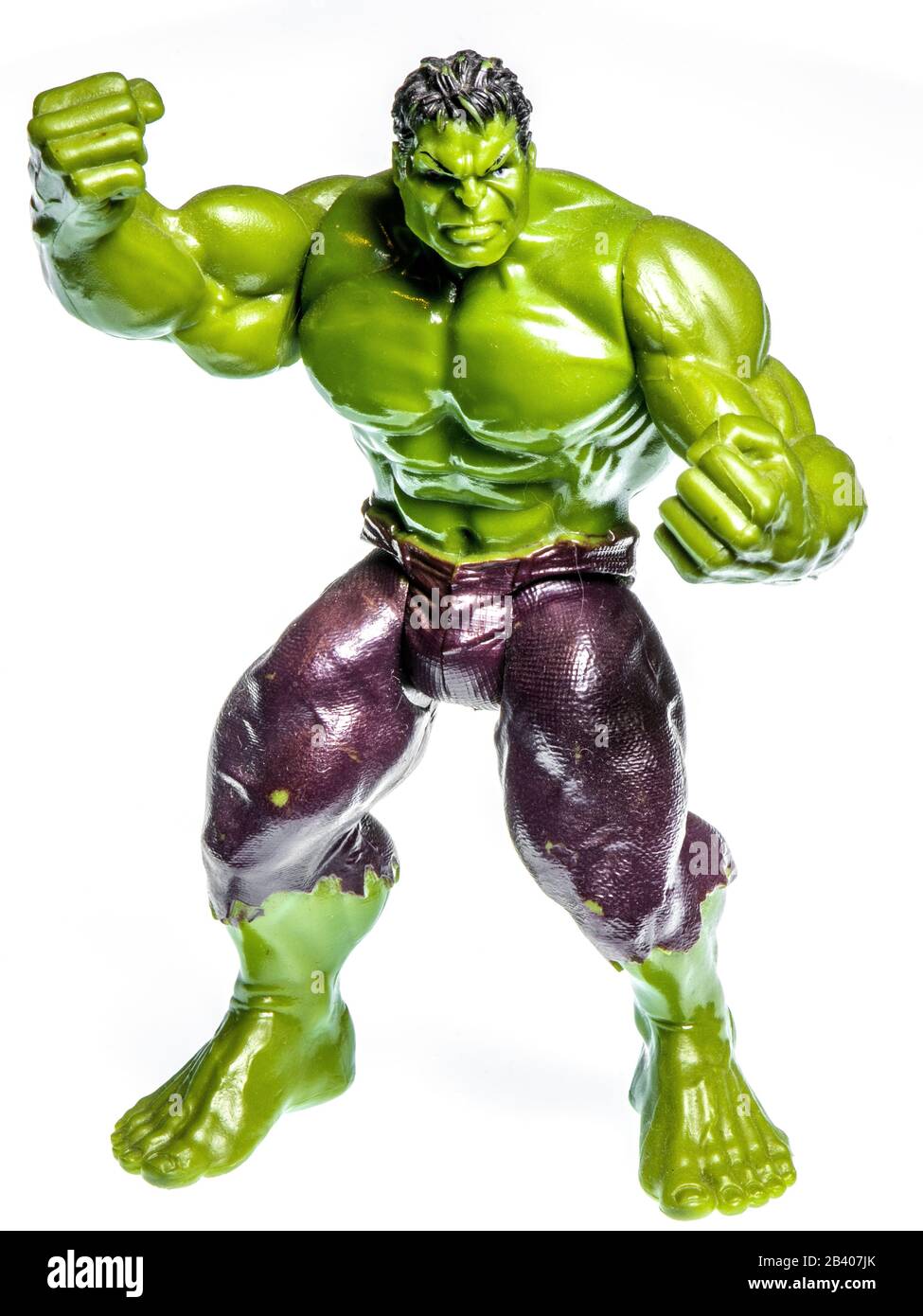 Action figure of a muscular angry green man, small toy Stock Photo - Alamy