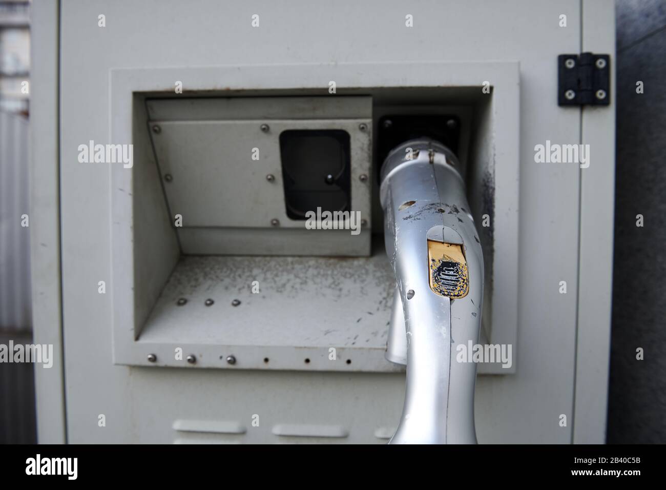 An old silver aluminium plug-in connector at the electric station. For ...