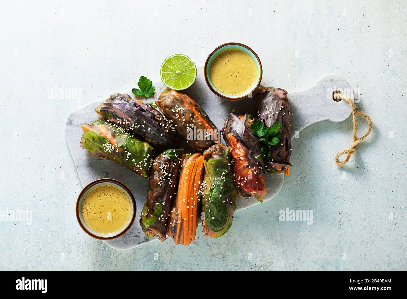 vegan rainbow summer rolls in rice wrapper with spicy almond sauce ...