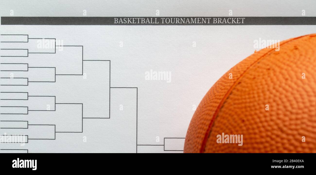 Blank bracket grid on white paper with basketball on top Stock Photo ...