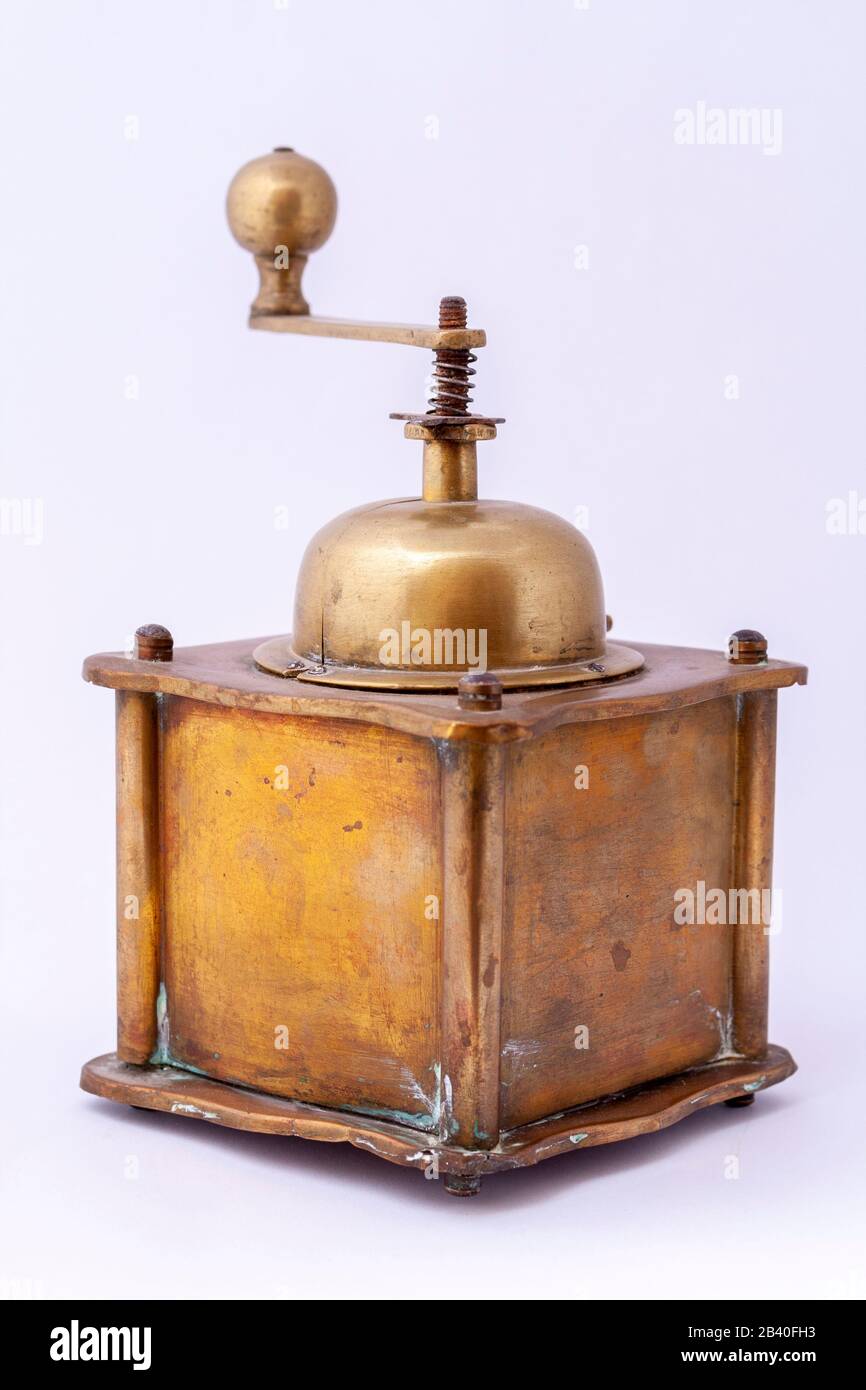 Old copper coffee grinder isolated on white background Stock Photo - Alamy