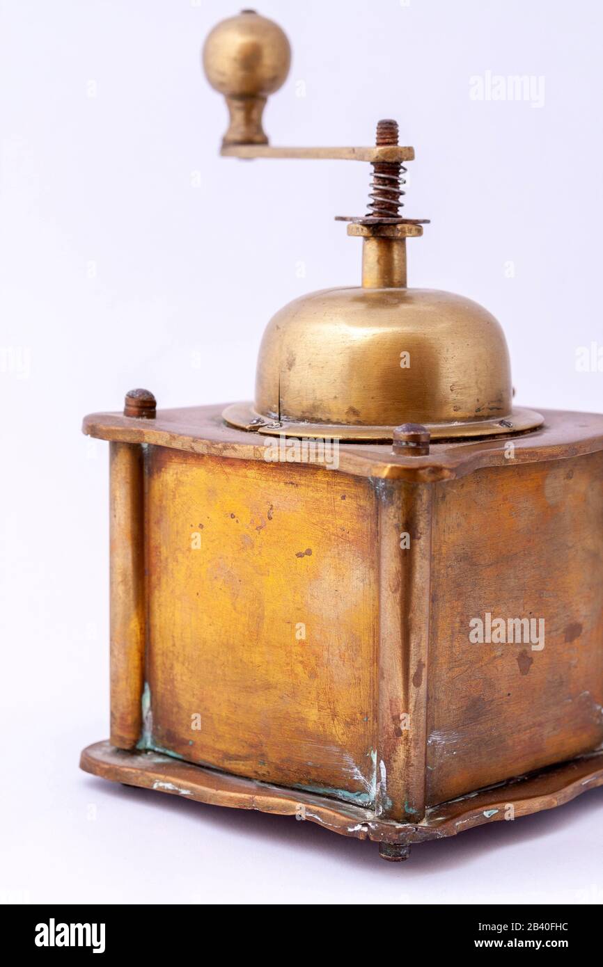 Old copper coffee grinder isolated on white background Stock Photo - Alamy