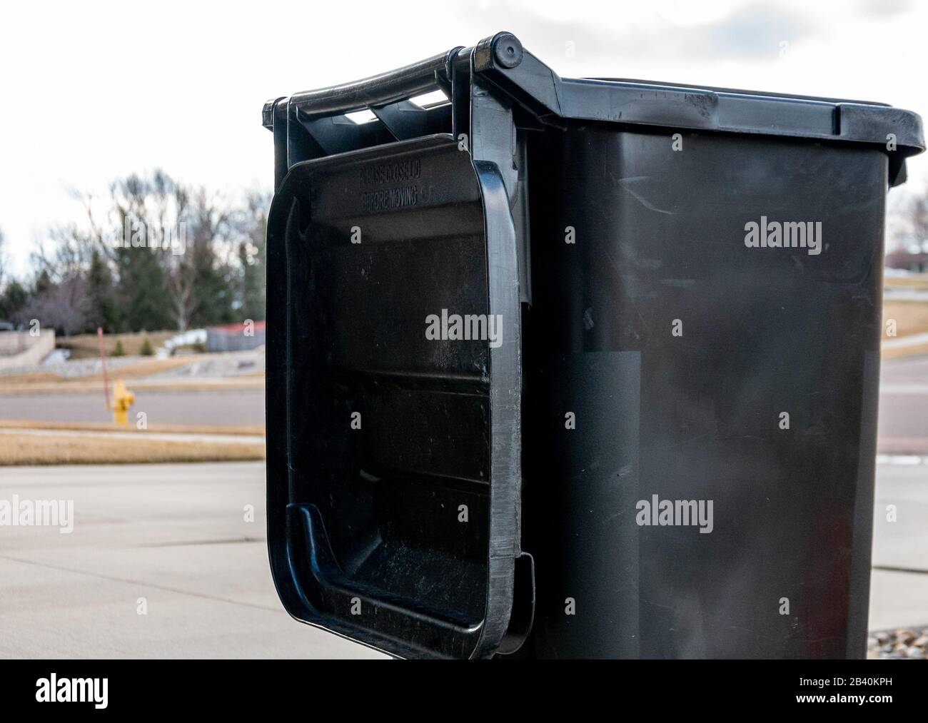 open black garbage can bins for trash and recycling Stock Photo - Alamy