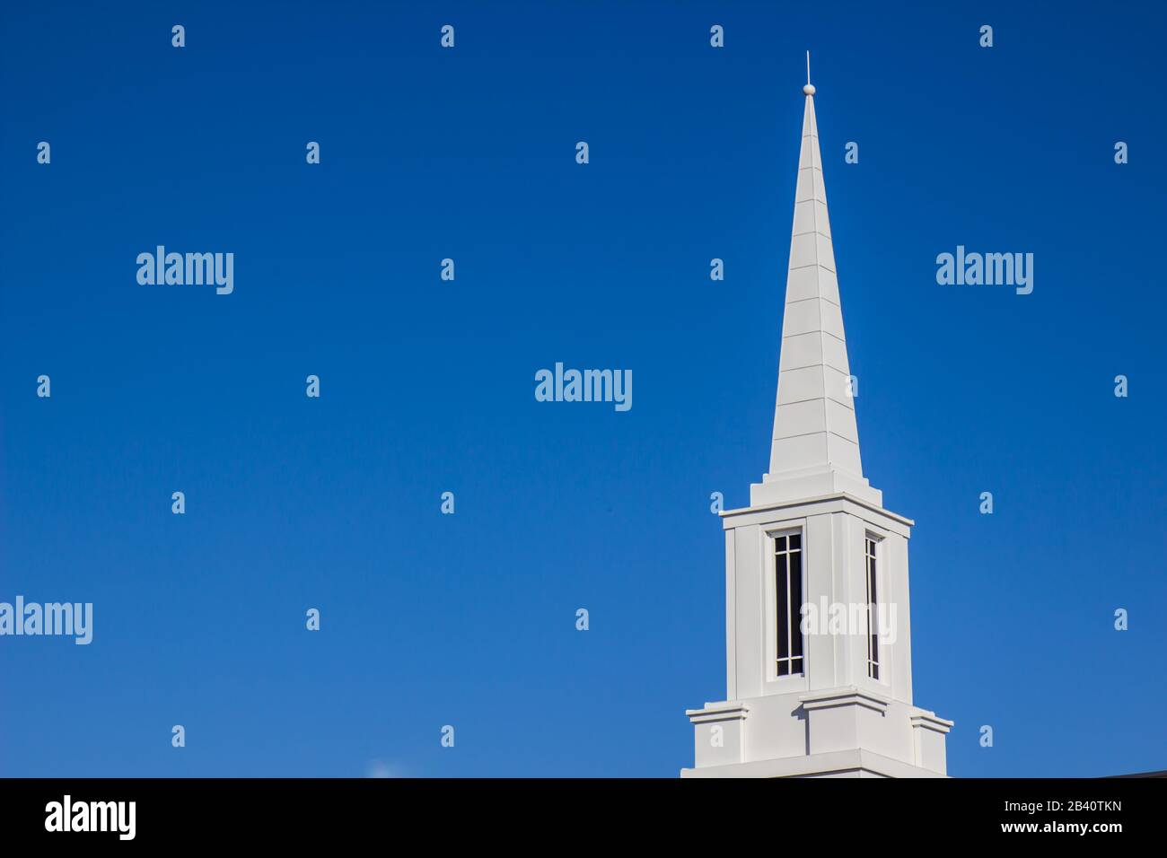White Church Tower With Steeple Stock Photo - Alamy