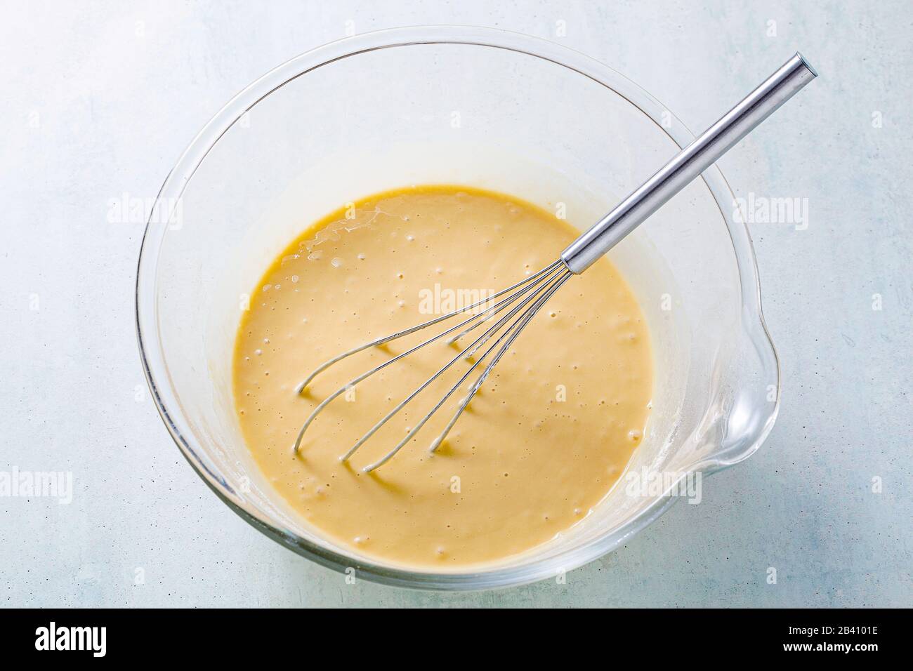 ready batter in a glass bowl for frying vegetables in oil Stock Photo ...