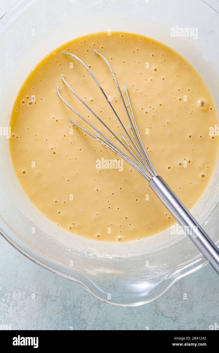 ready batter in a glass bowl for frying vegetables in oil Stock Photo ...
