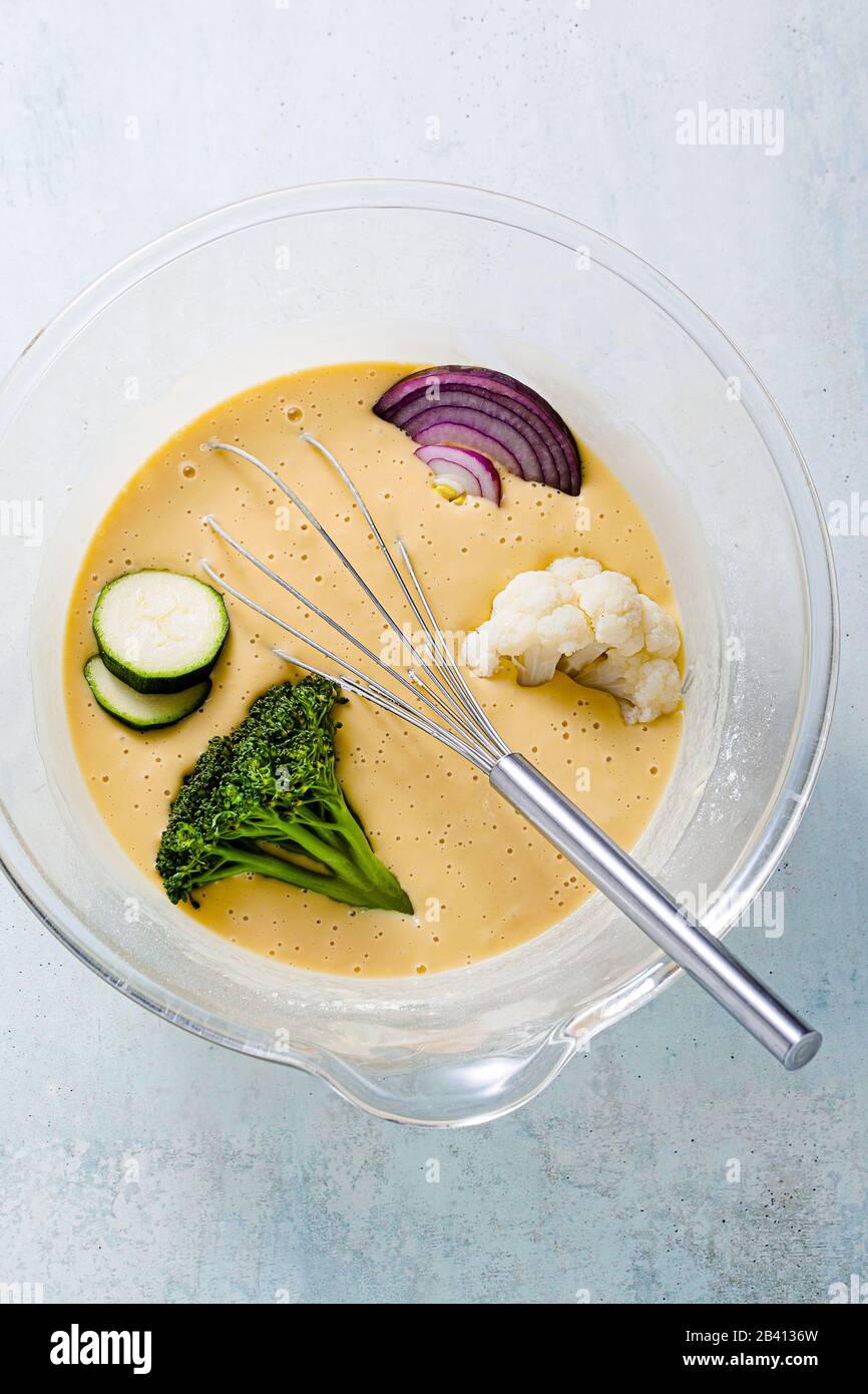 ready batter in a glass bowl for frying vegetables in oil Stock Photo ...
