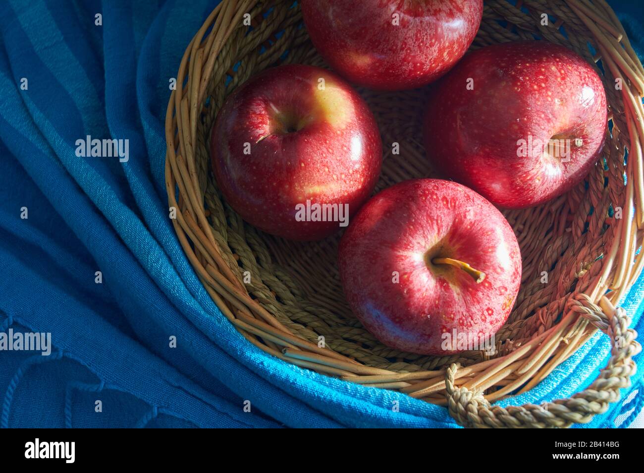 Red sweet apples hand hi-res stock photography and images - Alamy