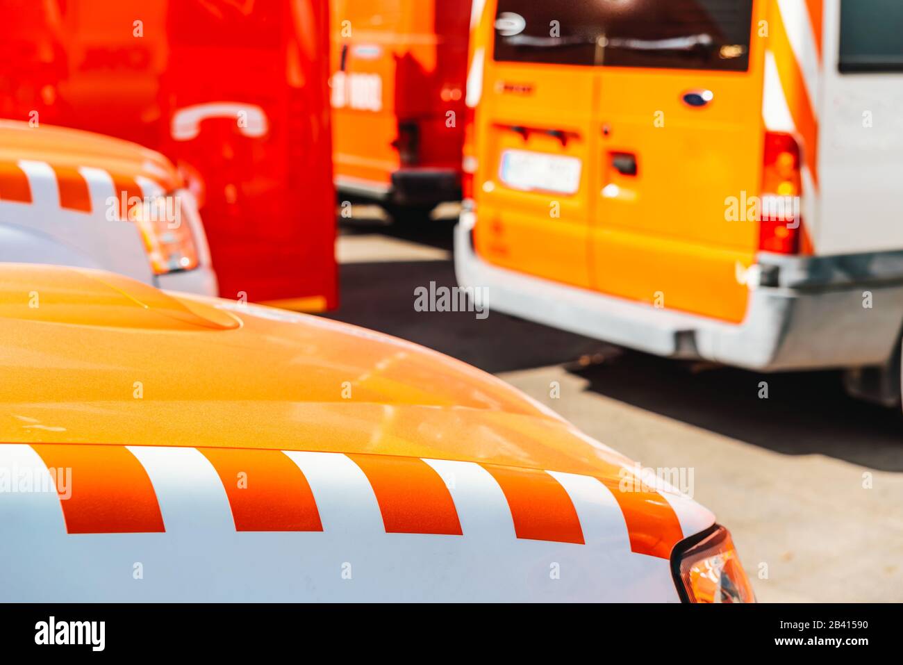 Detail of a fire and emergency vehicle, with the unfocused background ...