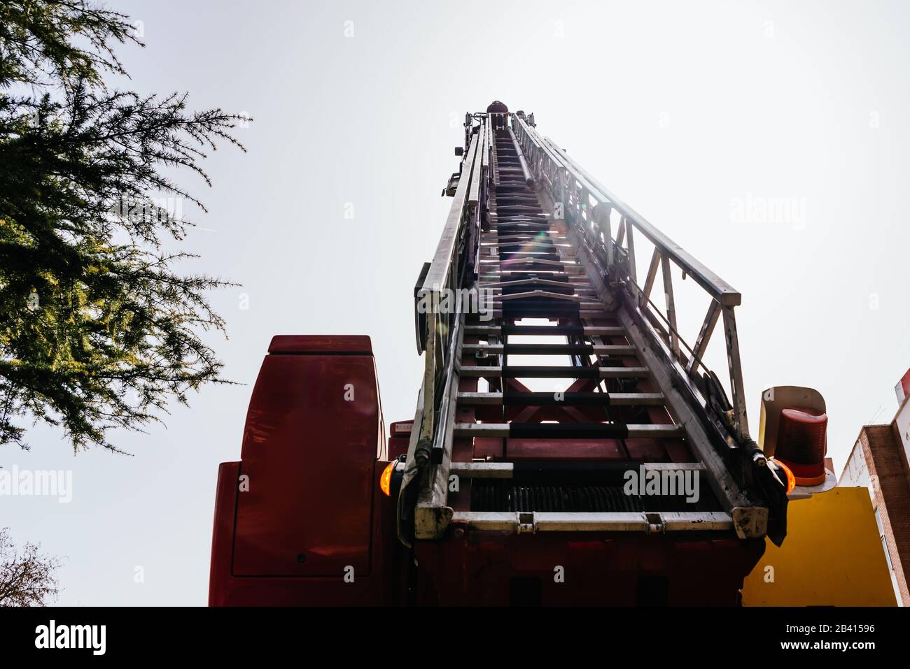 High deployed ladder of a fire truck Stock Photo - Alamy