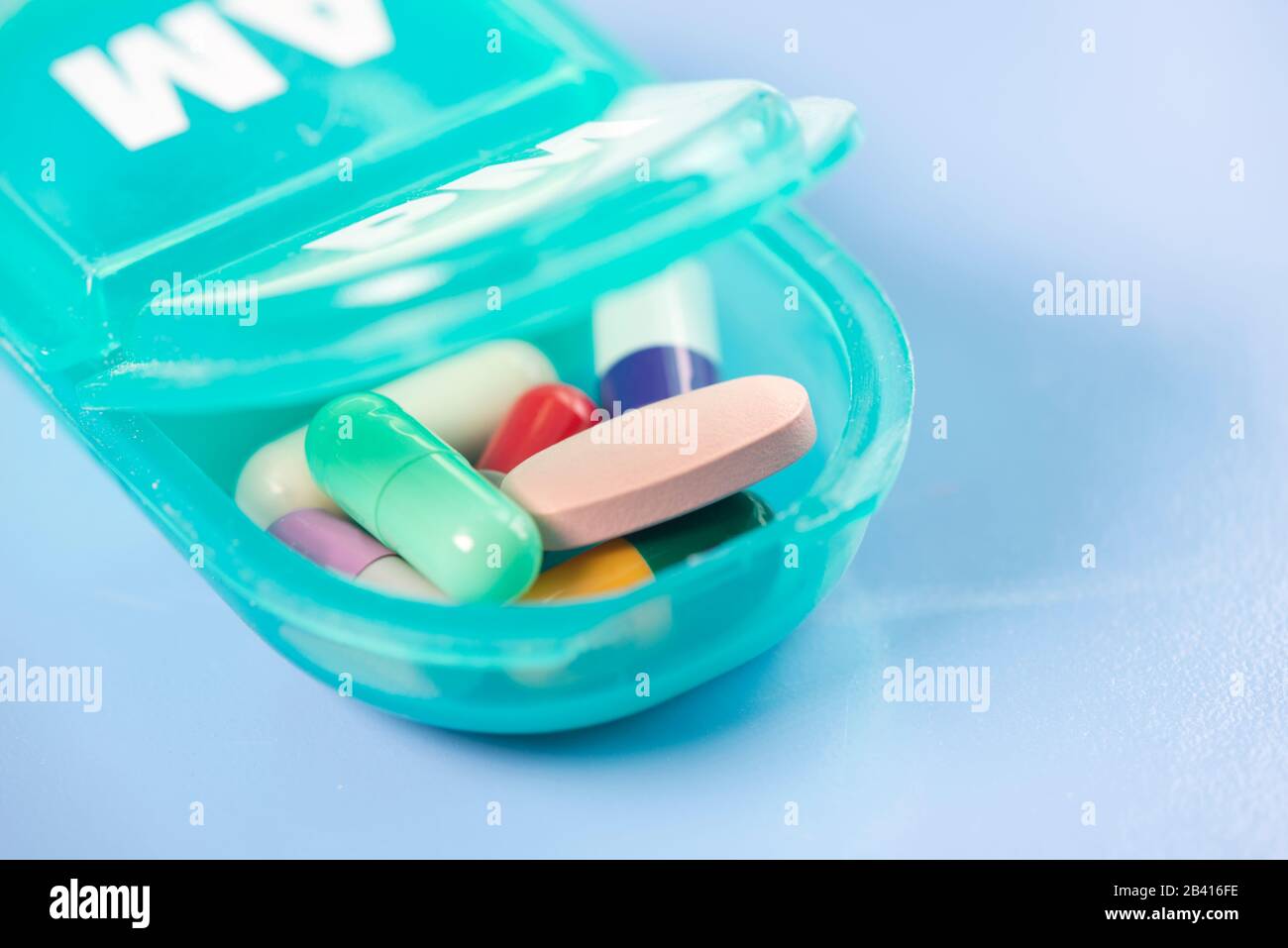Pill dispenser hi-res stock photography and images - Alamy