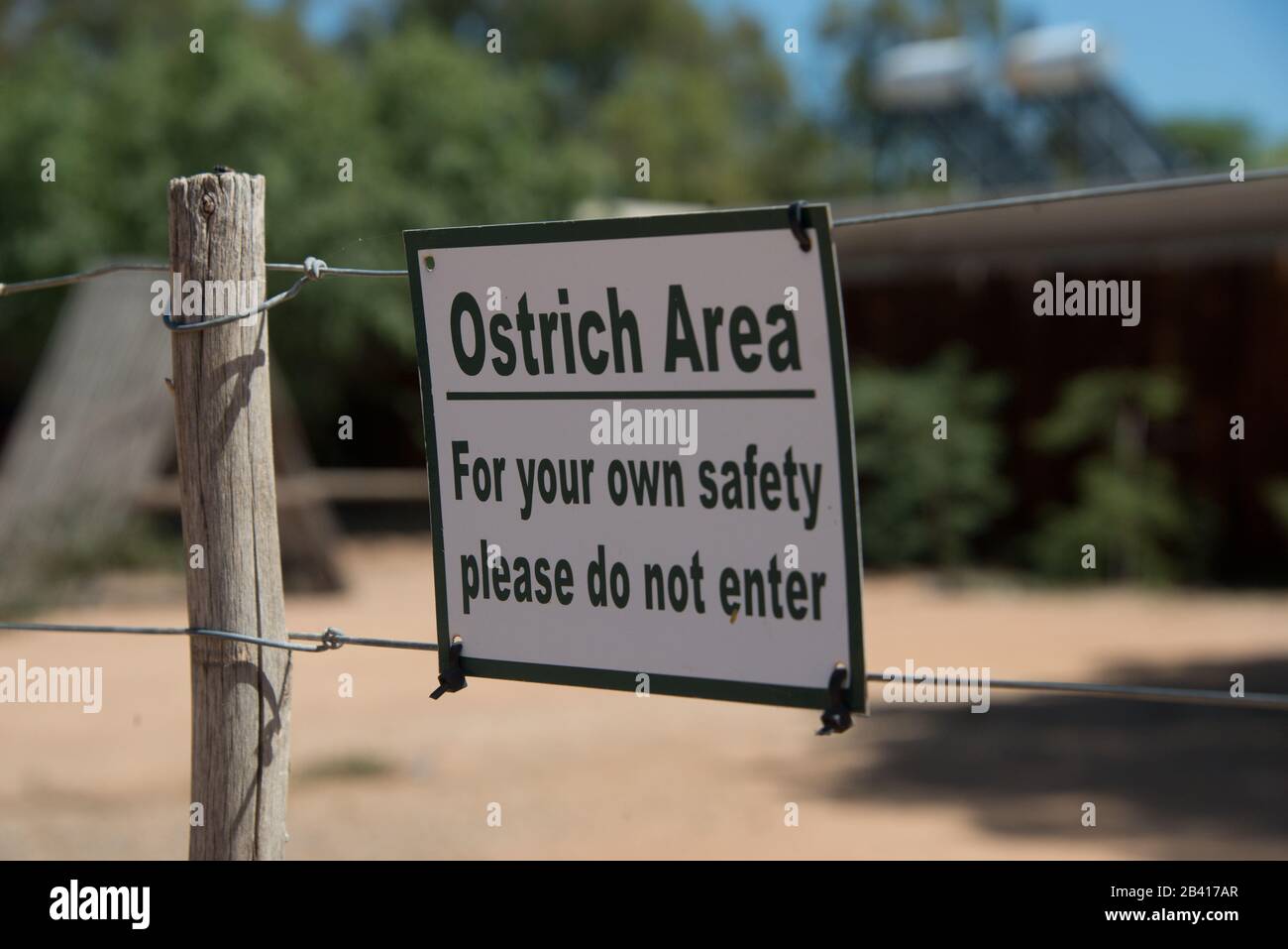 warning sign on ostrich farm in oudtshoorn, south africa Stock Photo ...