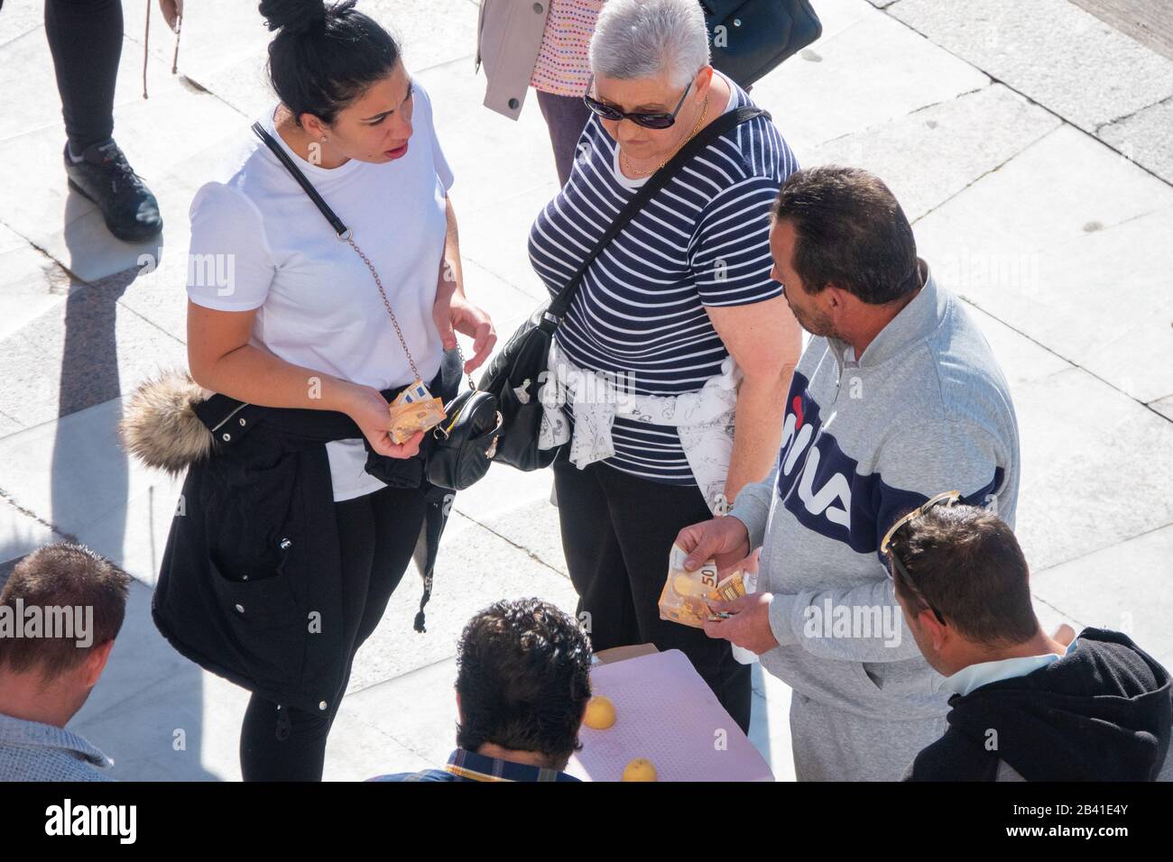 Three shell game, con artists on the city streets, all the people ...