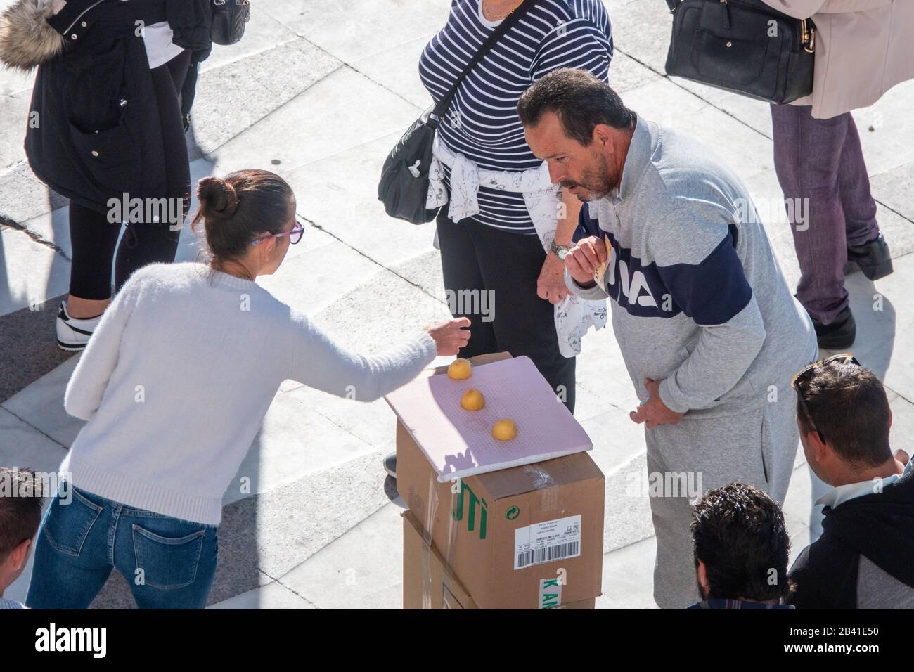 Three shell game, con artists on the city streets, all the people ...