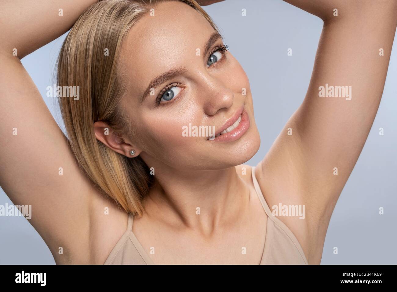 Contented young Caucasian female posing for the camera Stock Photo - Alamy