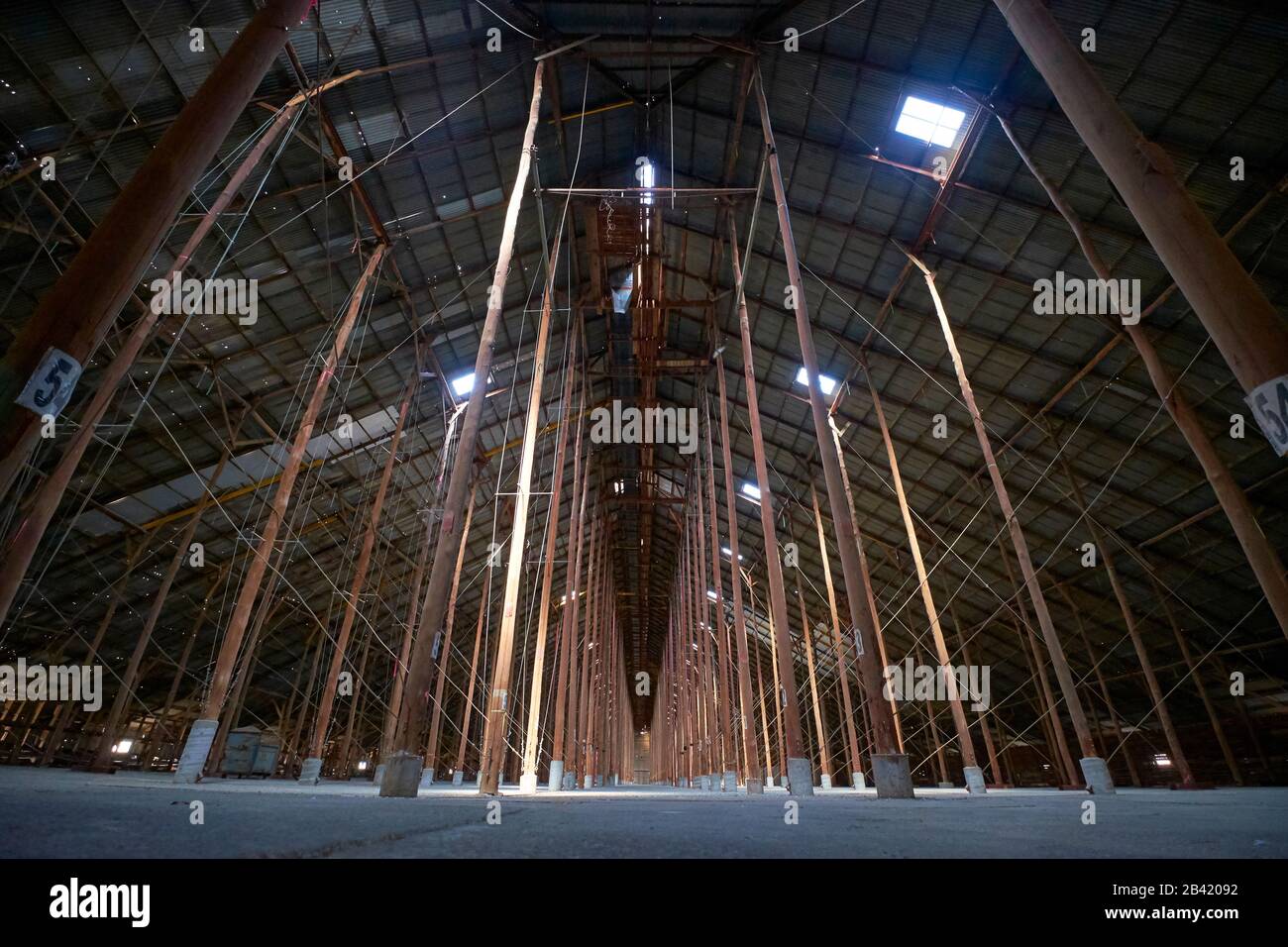 Interior of the huge stick shed, used for storing excess grain during ...